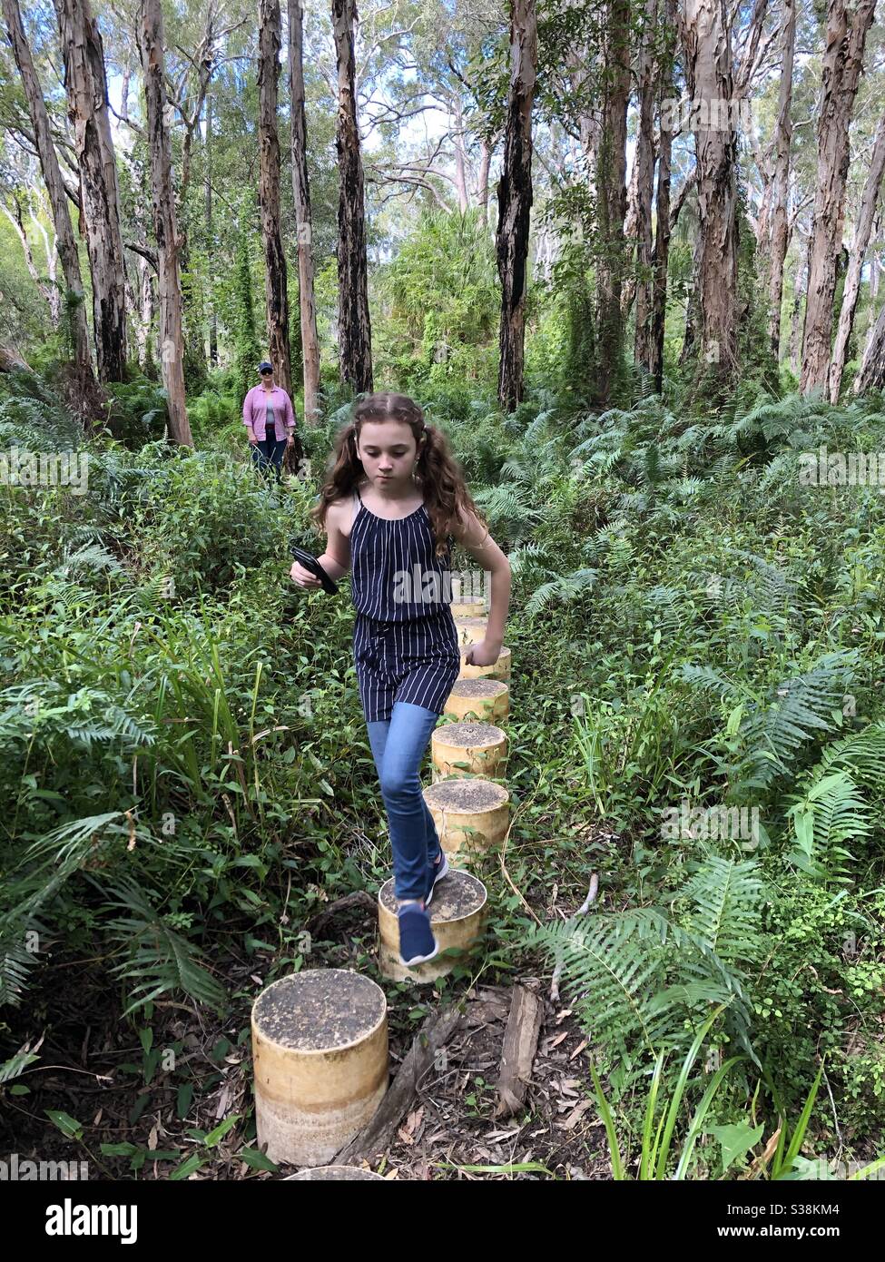 Child stepping stones hi-res stock photography and images - Alamy