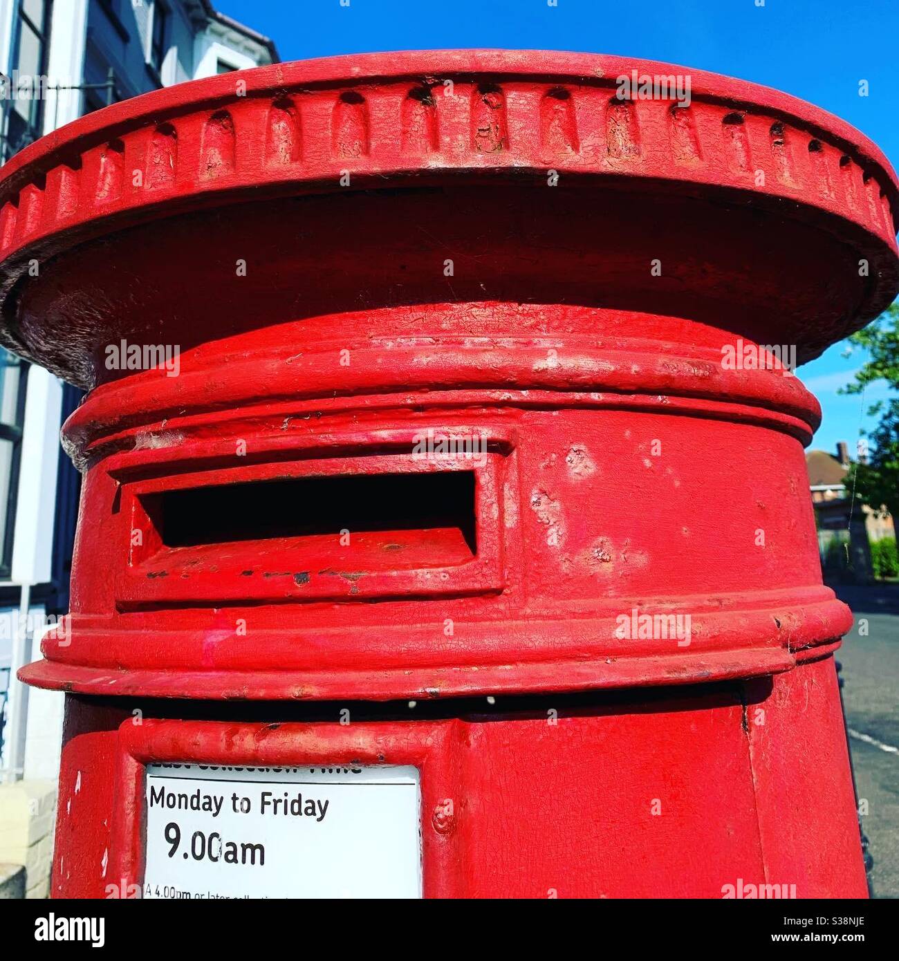 A red pillar post box, on a pavement in Great Yarmouth, UK Stock Photo ...