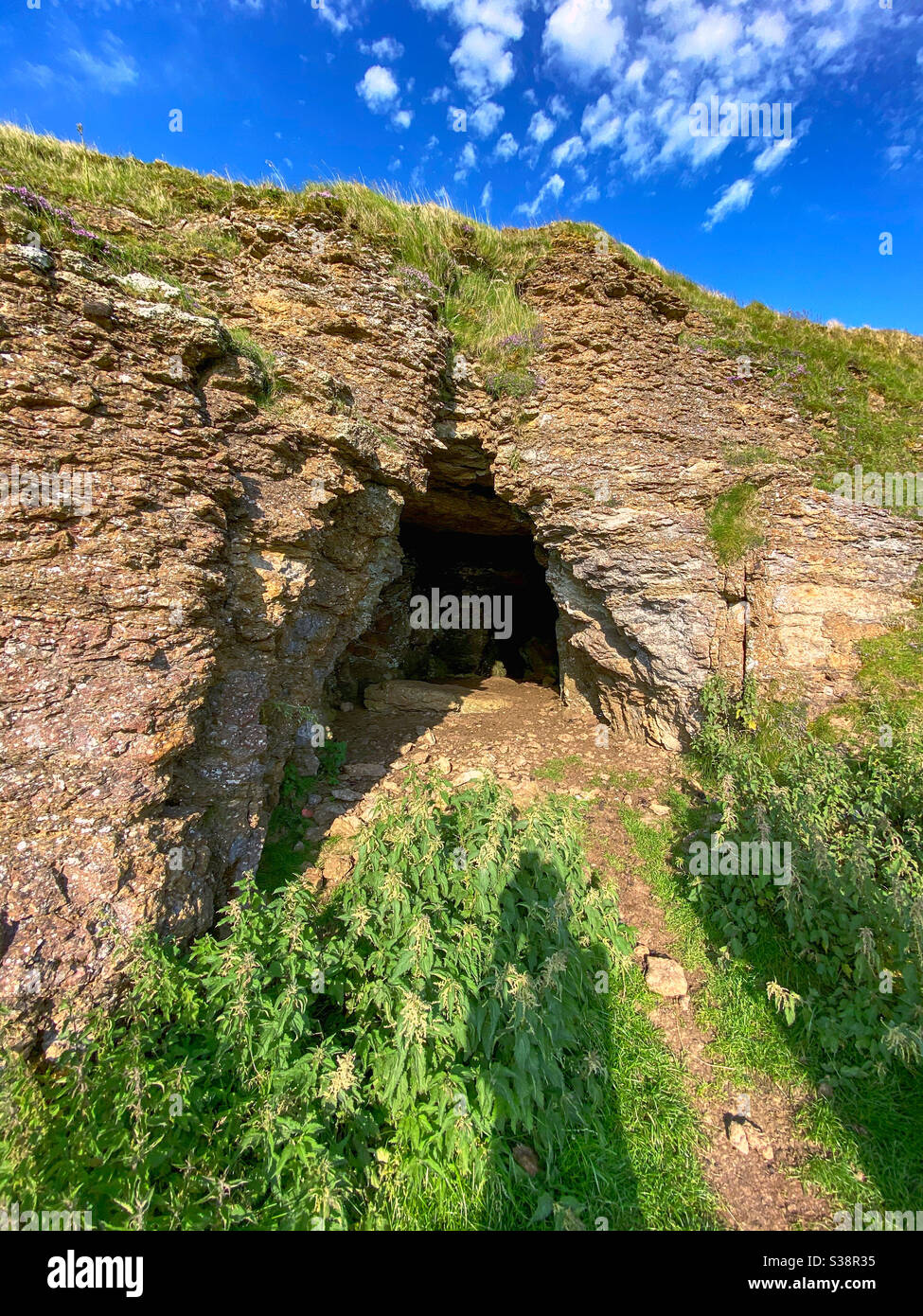 Hillside cave hi-res stock photography and images - Alamy