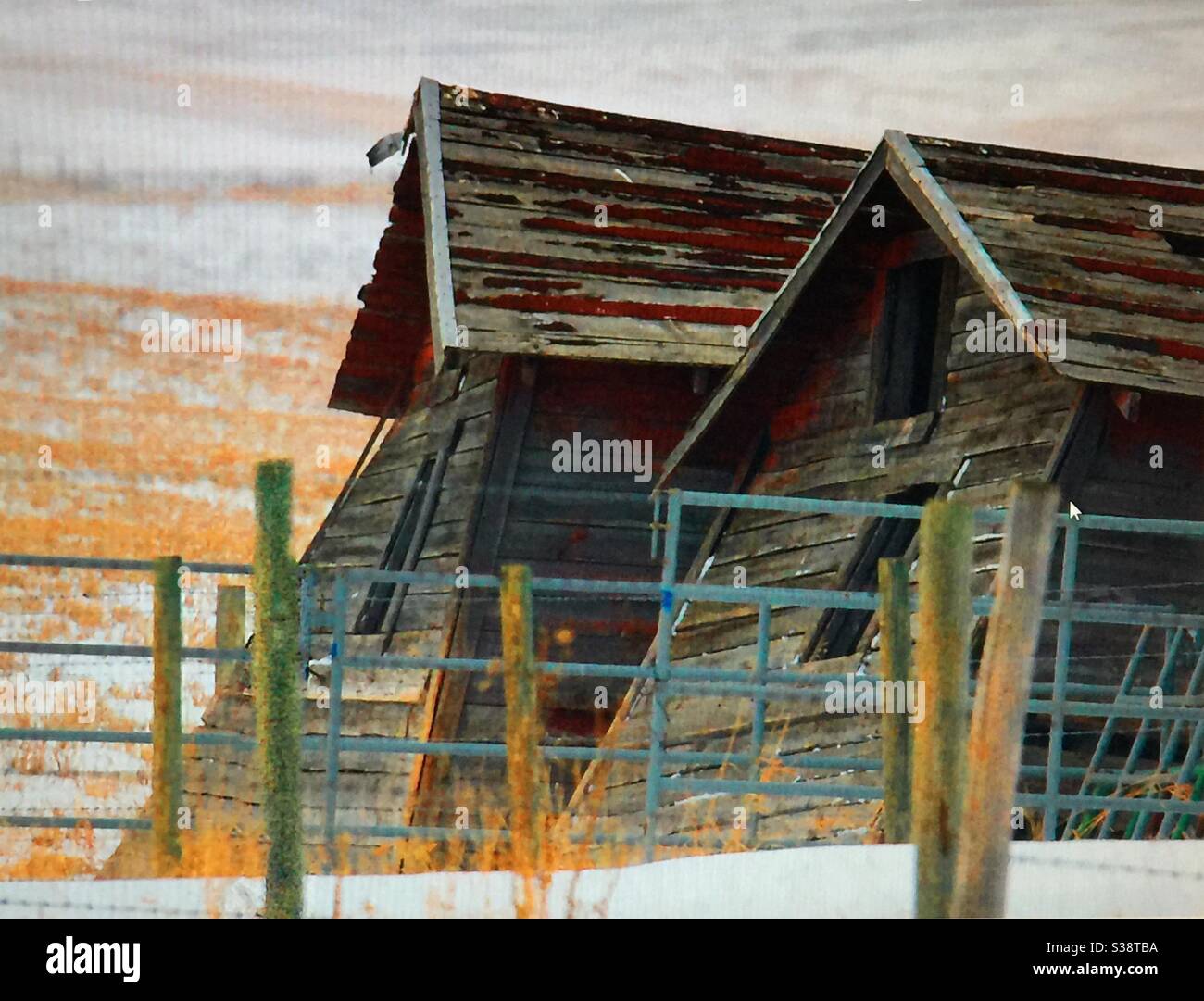 Two granaries, old, sagging, leaning, tipping, need proving up Stock ...