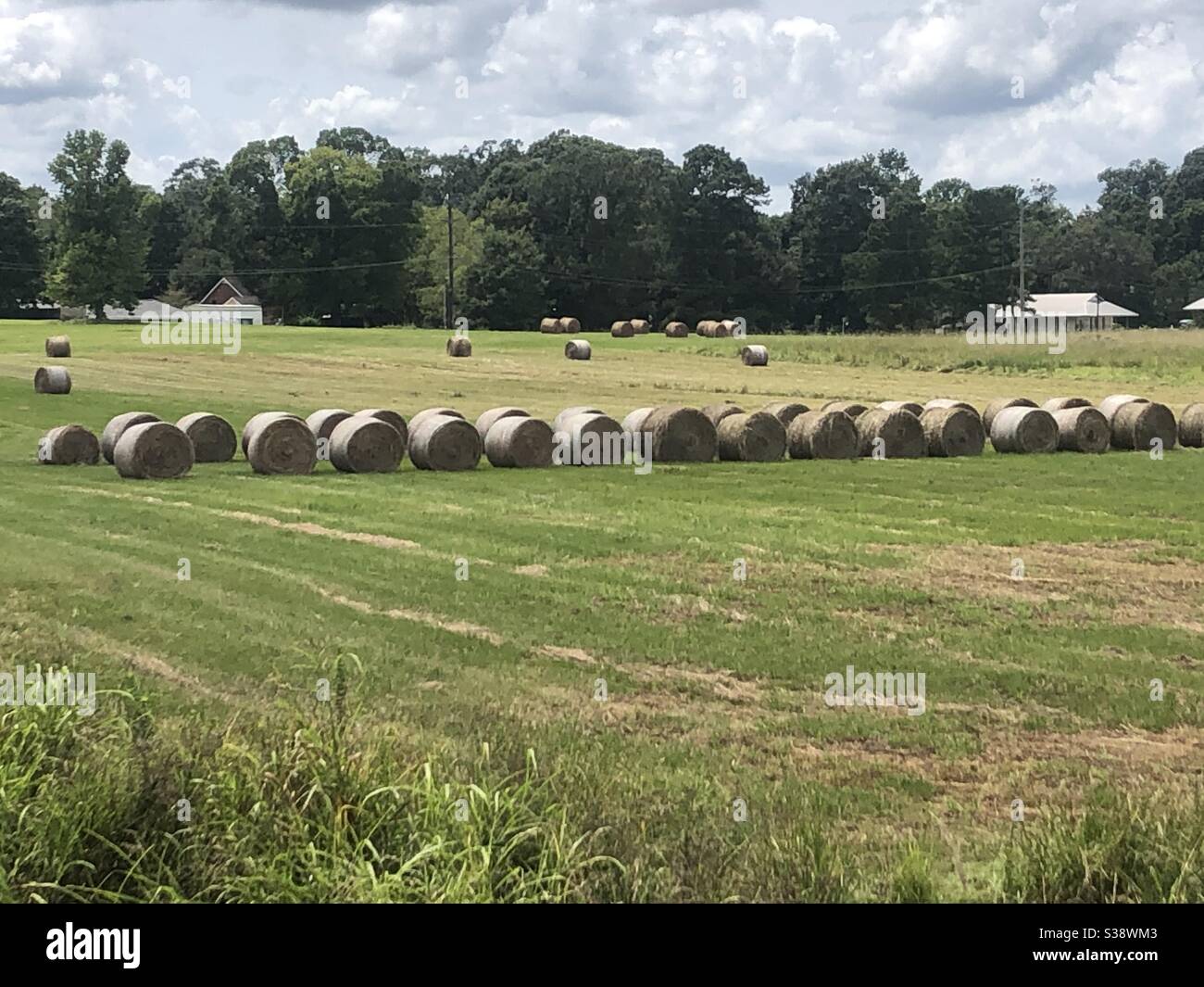 Stacked hay bails hi-res stock photography and images - Alamy