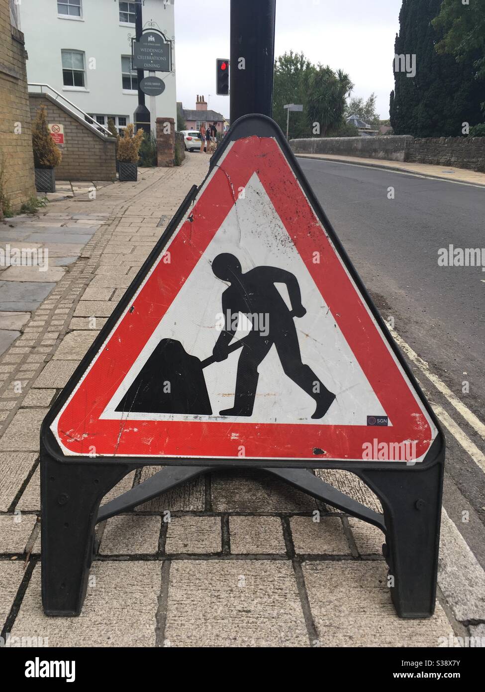 Man digging road work sign hi-res stock photography and images - Alamy
