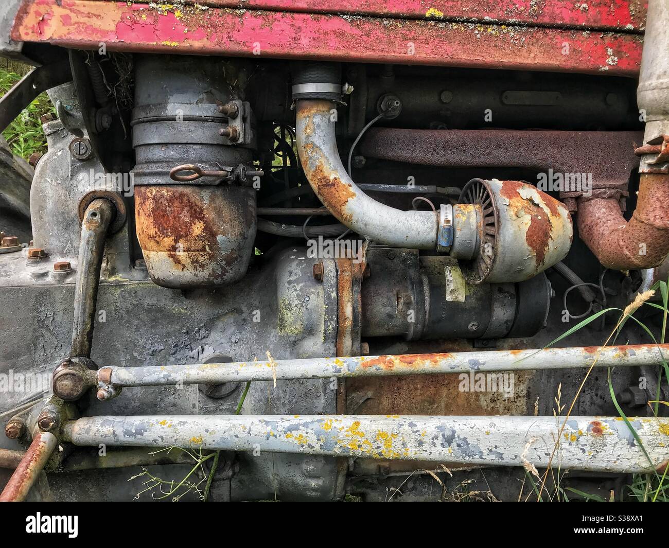 Rusted engine in tractor Stock Photo - Alamy