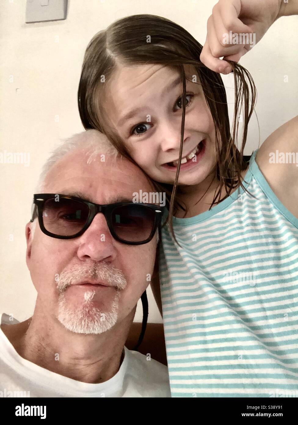 Dad and daughter having a selfie Stock Photo - Alamy