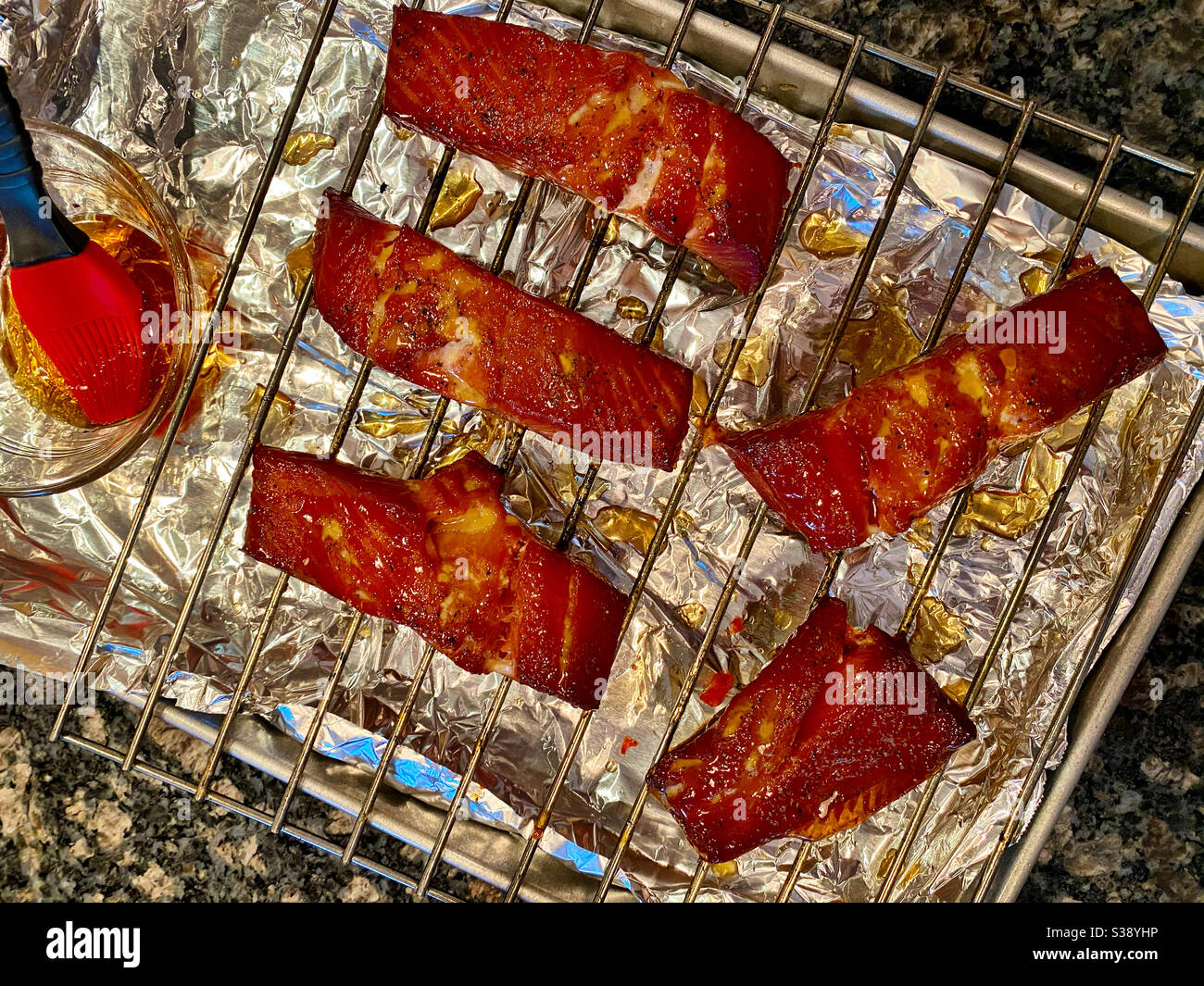 Smoked salmon on a cooling rack Stock Photo - Alamy