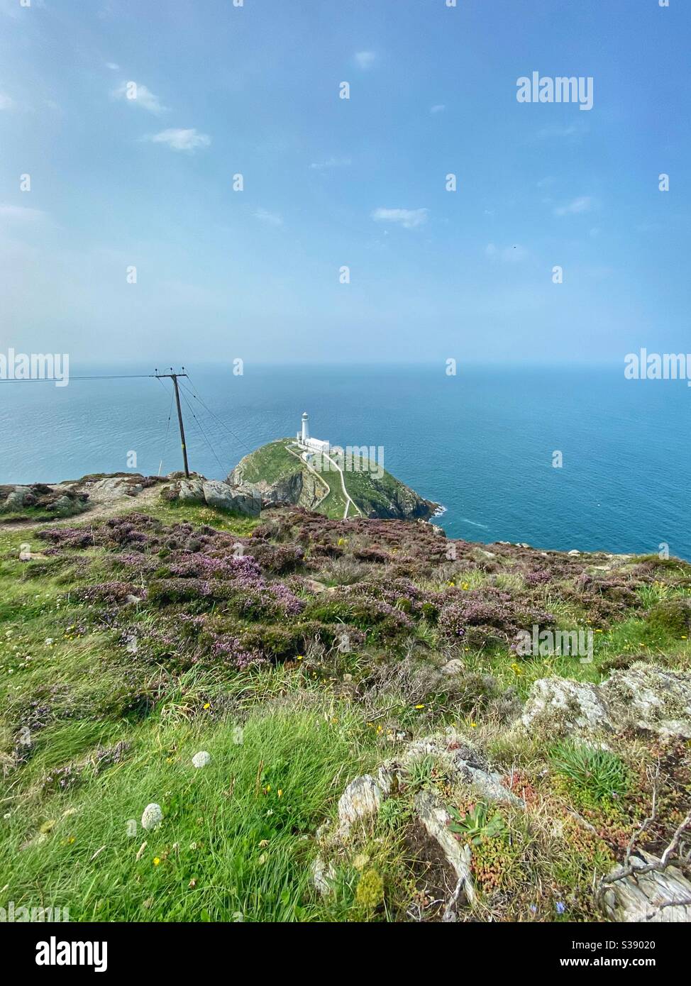 Wide angle view of South Stack lighthouse from the cliff above ...