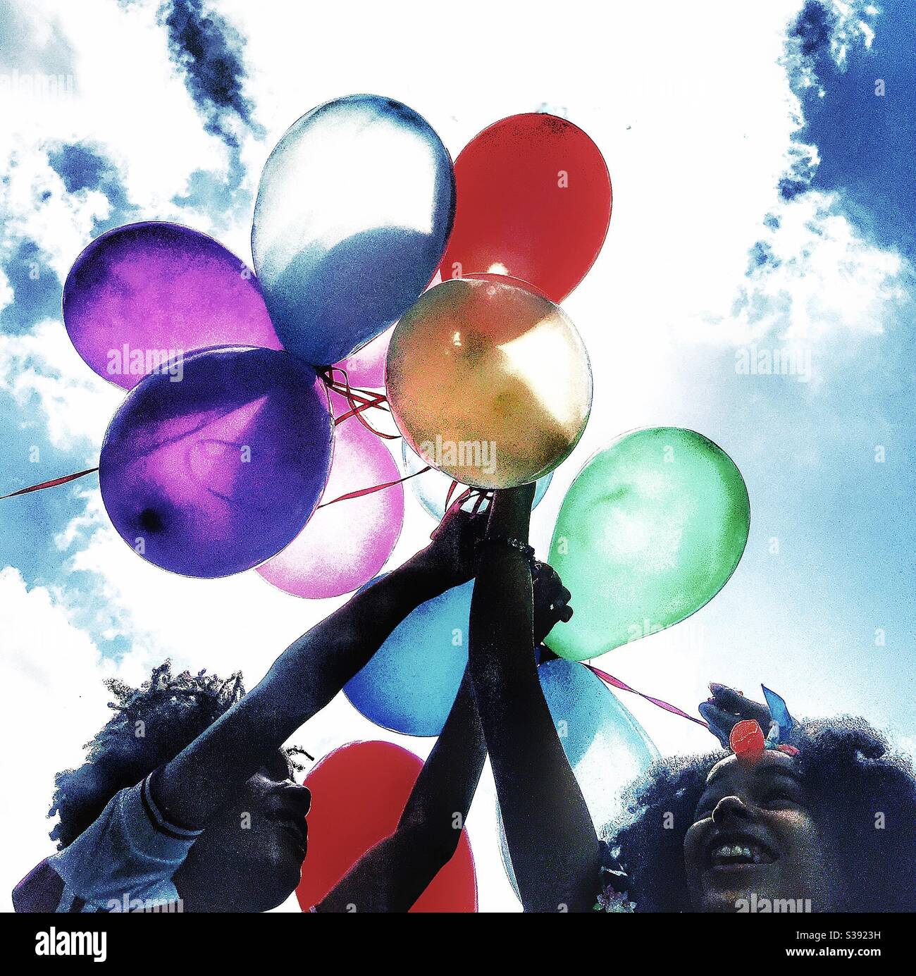 Kids having fun with balloons Stock Photo - Alamy