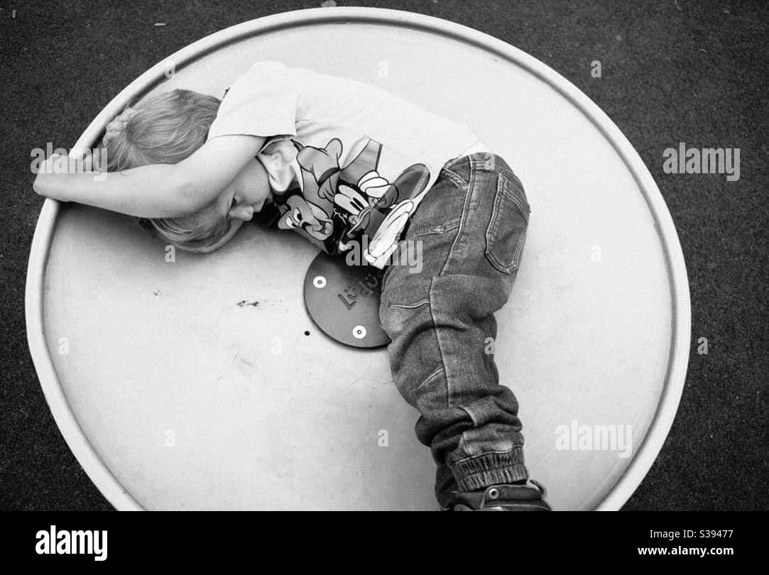 Boy at a wheel Black and White Stock Photos & Images - Alamy