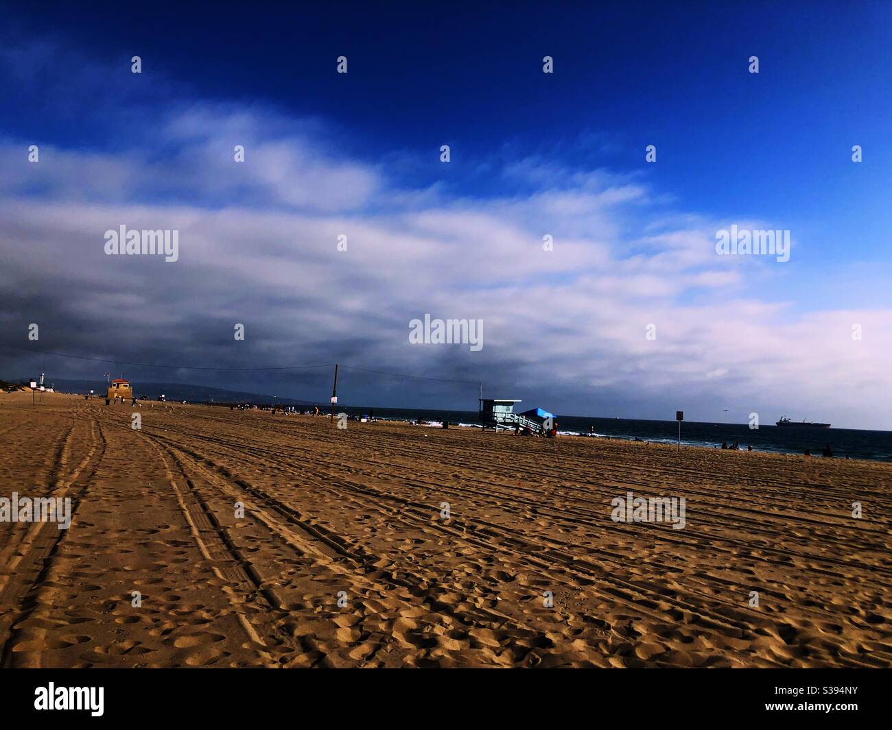 Cloudy beach hi-res stock photography and images - Alamy