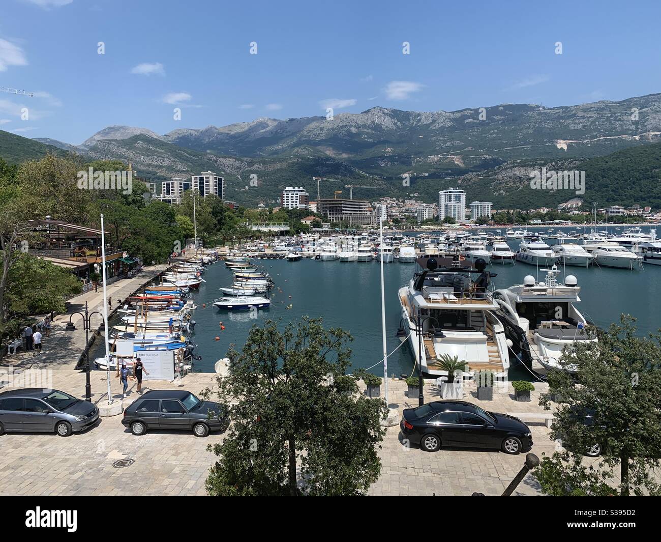 Port at Budva coastal city in Montenegro with boats and cars Stock ...