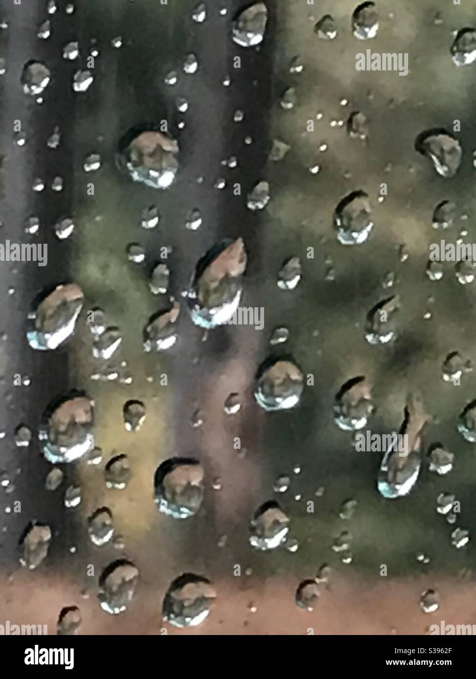Abstract water droplets on a window glass Stock Photo - Alamy