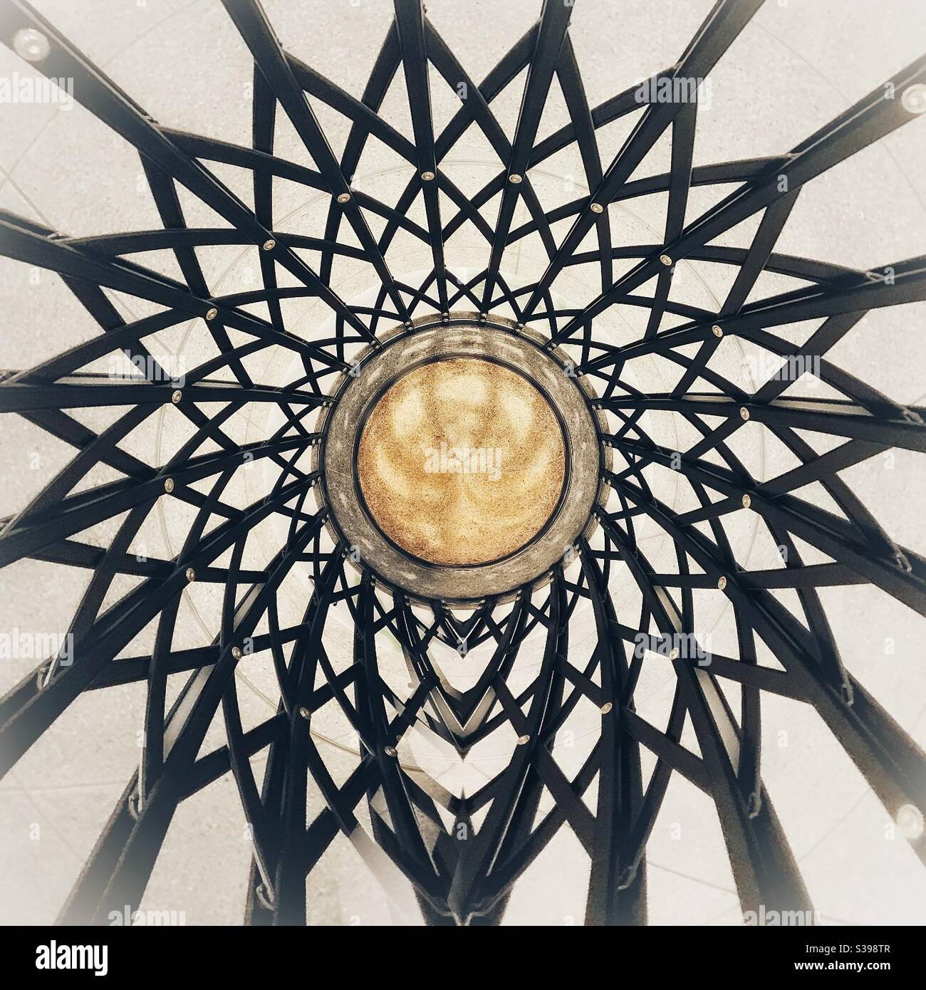 Metal sliding gate structure edited to circular effect Stock Photo - Alamy