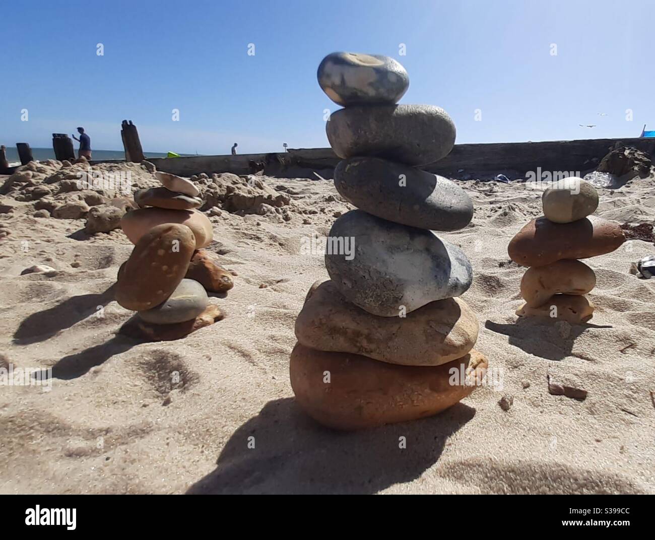 Stacked pebbles on a beach Stock Photo - Alamy