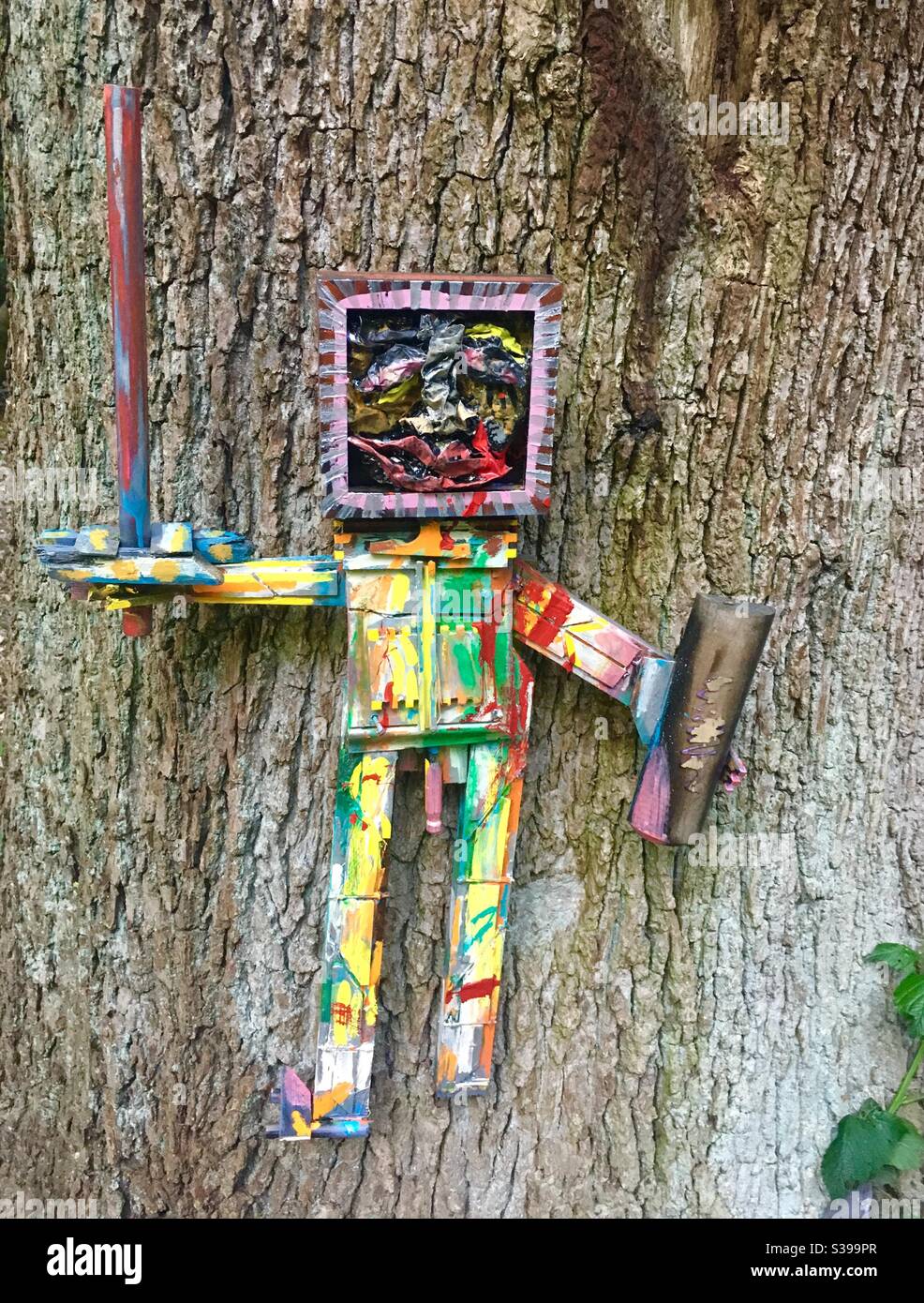 Art sculpture of a man with a sword made out of recycled materials ...