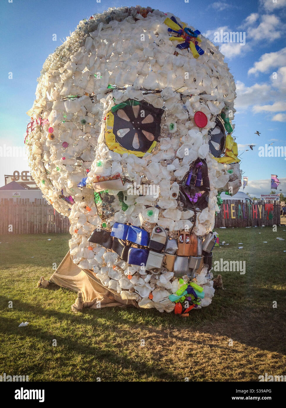 Skull sculpture made of recycled plastic milk jugs Stock Photo - Alamy