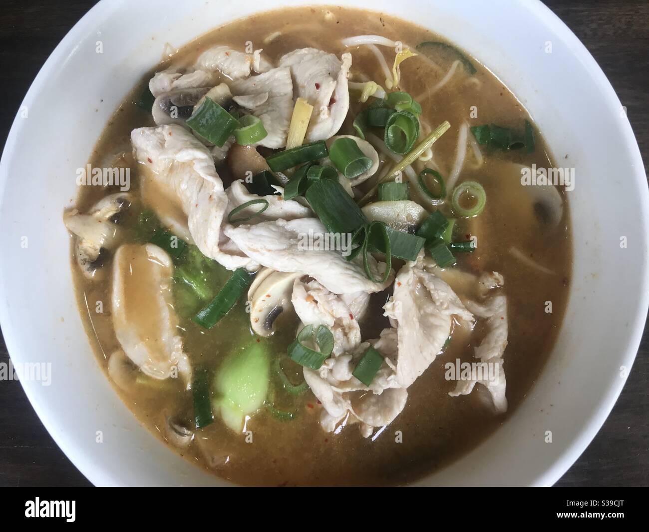 Thai Tom Tum chicken soup Stock Photo - Alamy