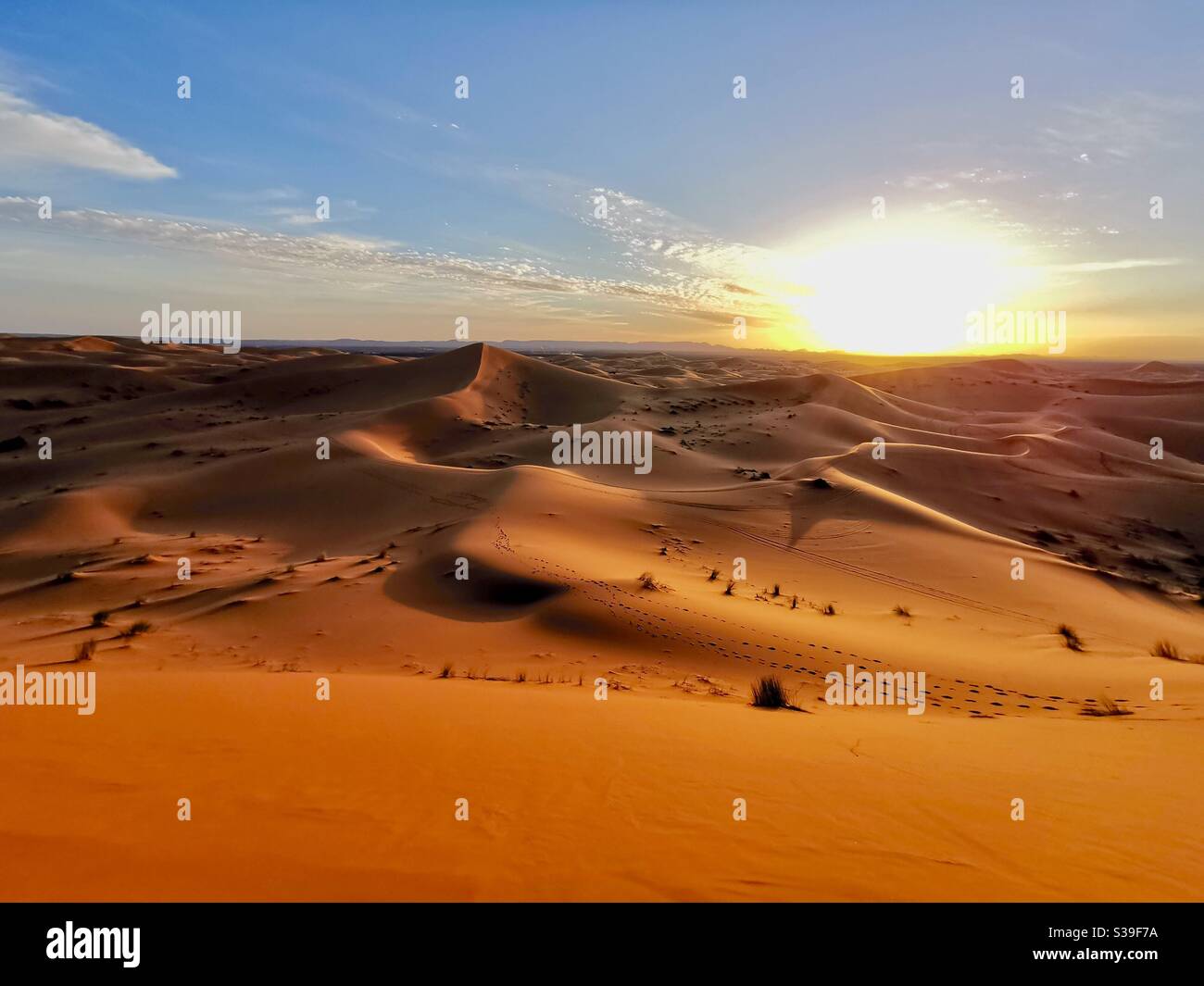 Sunset over the Sahara desert in Morocco Stock Photo - Alamy