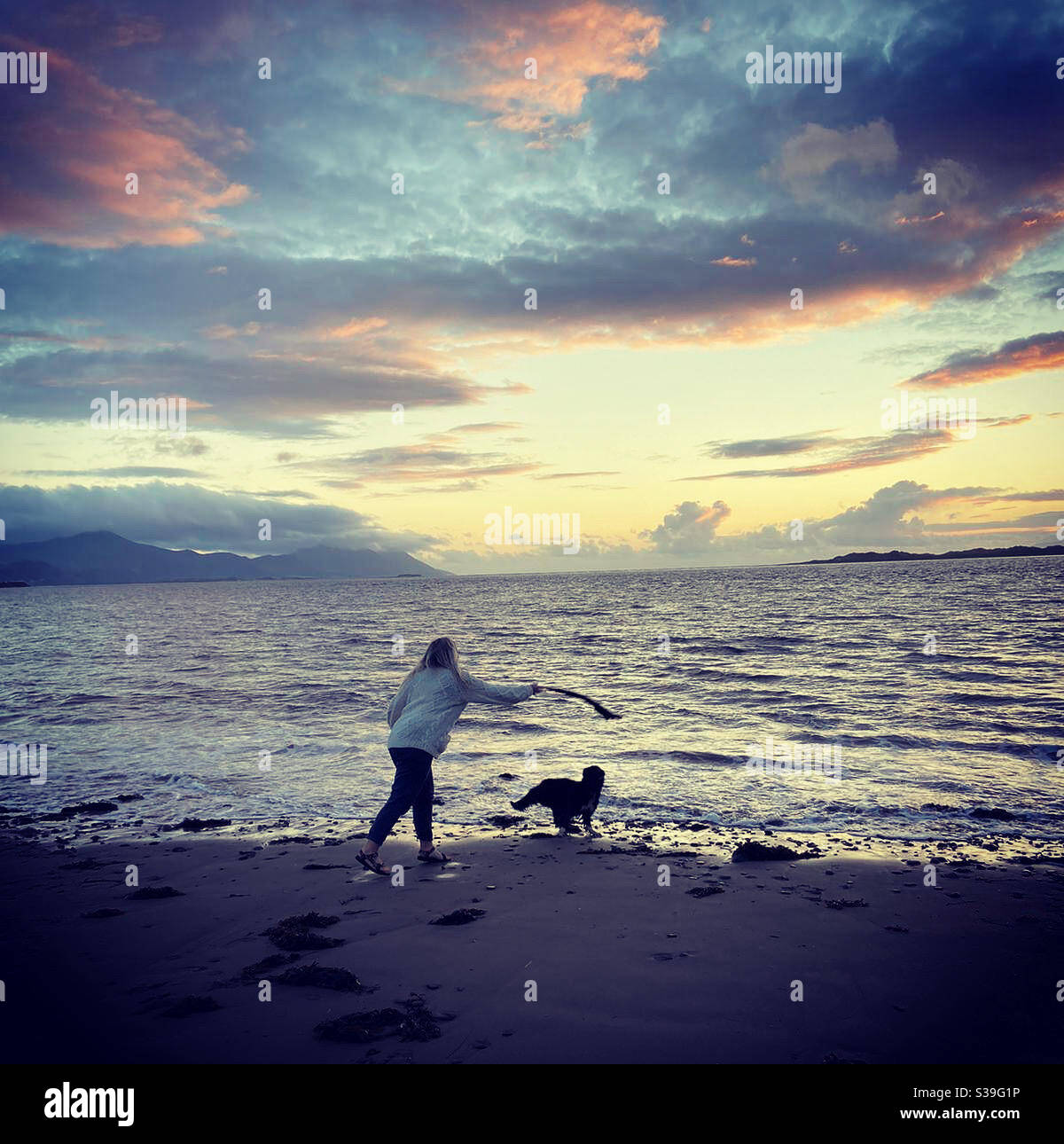 Playing with the beach dog at Sunset - Cromane Beach, County Kerry ...