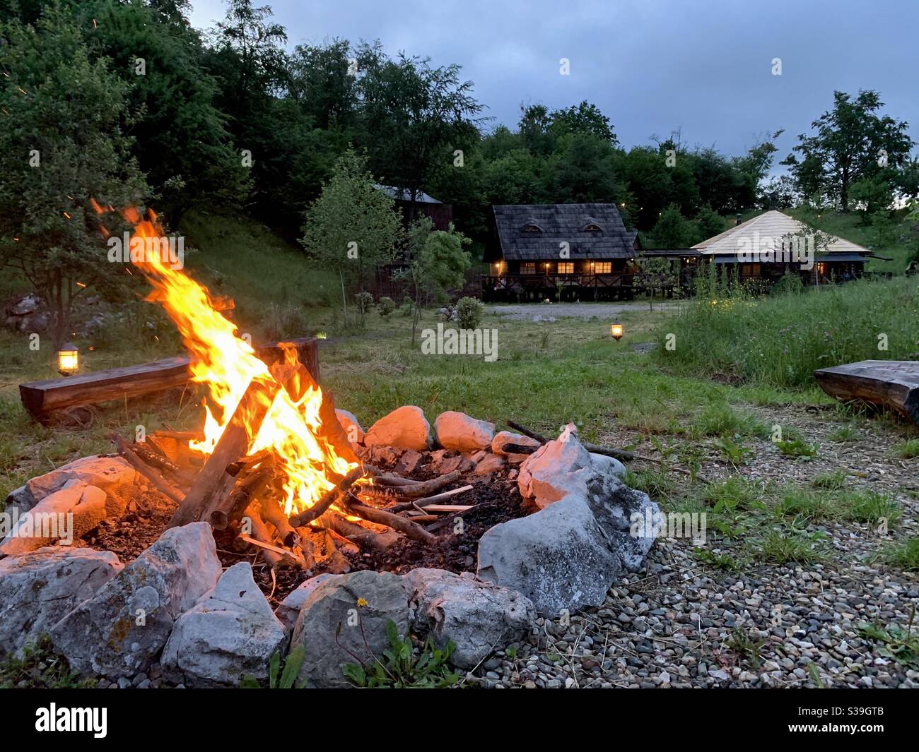 Campfire in a remote mountain village Stock Photo - Alamy