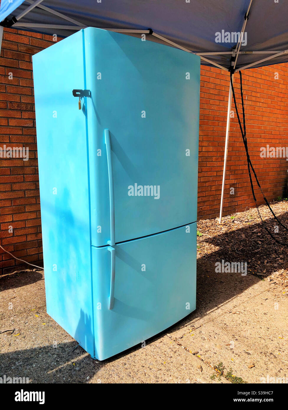 Fridge filled with free food by a city food bank, please help yourself ...