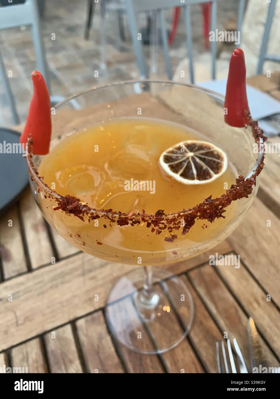 Spicy margarita with red chilli horns Stock Photo - Alamy