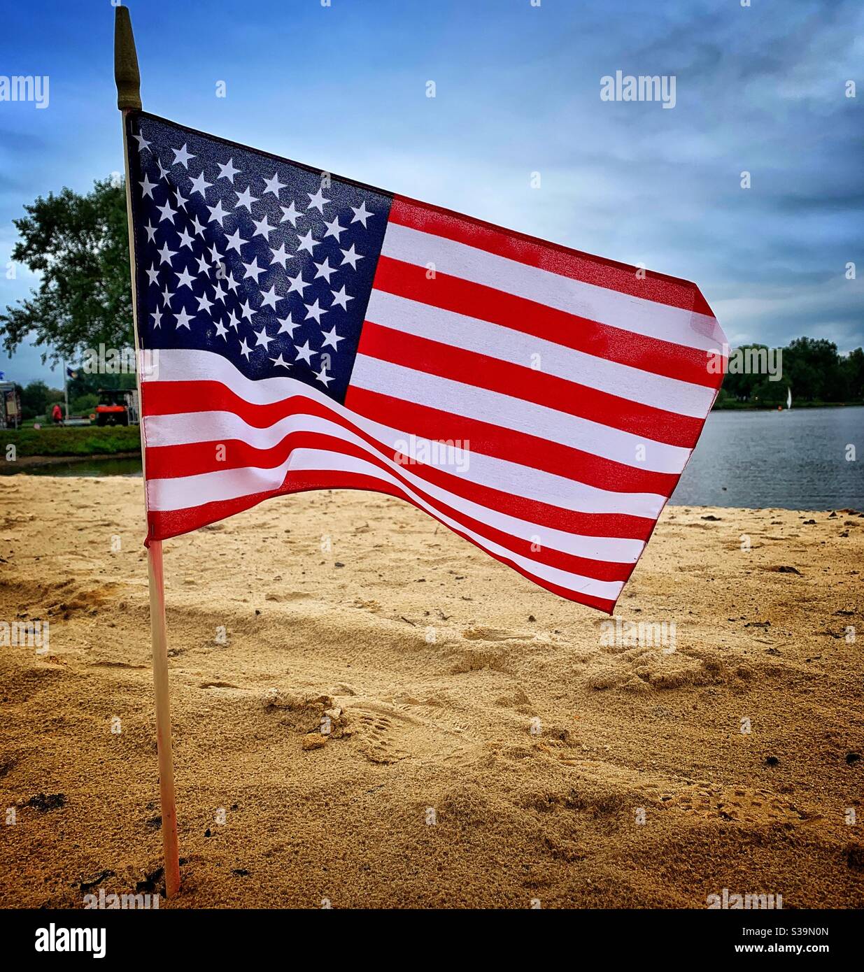 USA flag in the sand Stock Photo - Alamy