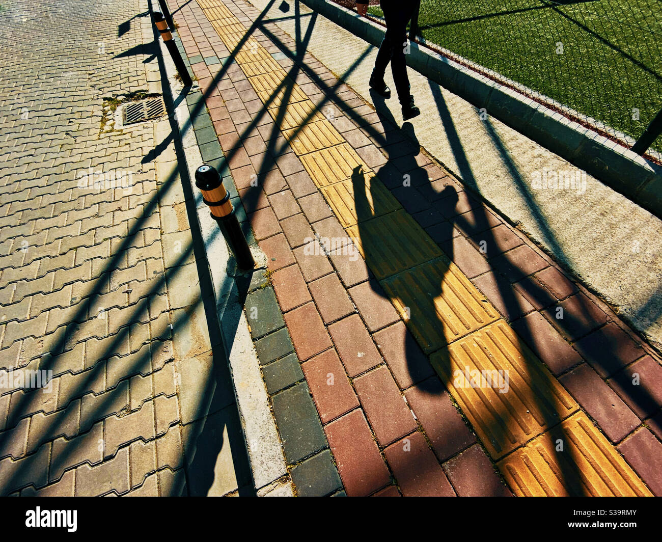 One person walking hi-res stock photography and images - Alamy