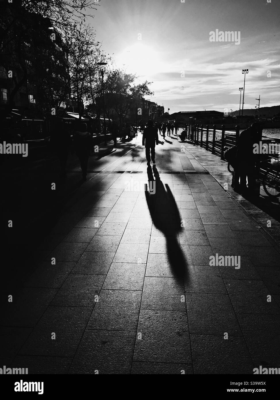 Silhouette of man walking Black and White Stock Photos & Images - Alamy