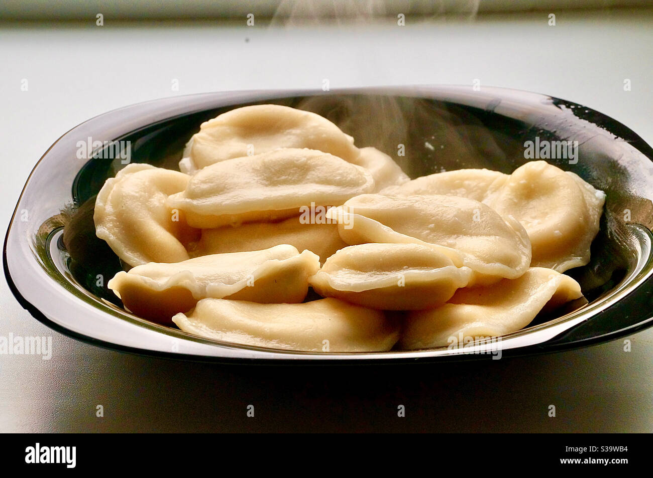 Steam dumplings hi-res stock photography and images - Alamy