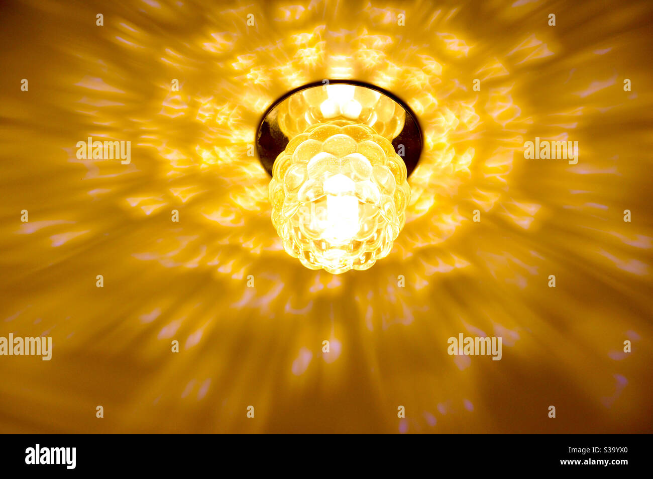 Bright lamp with beautiful rays of light Stock Photo - Alamy