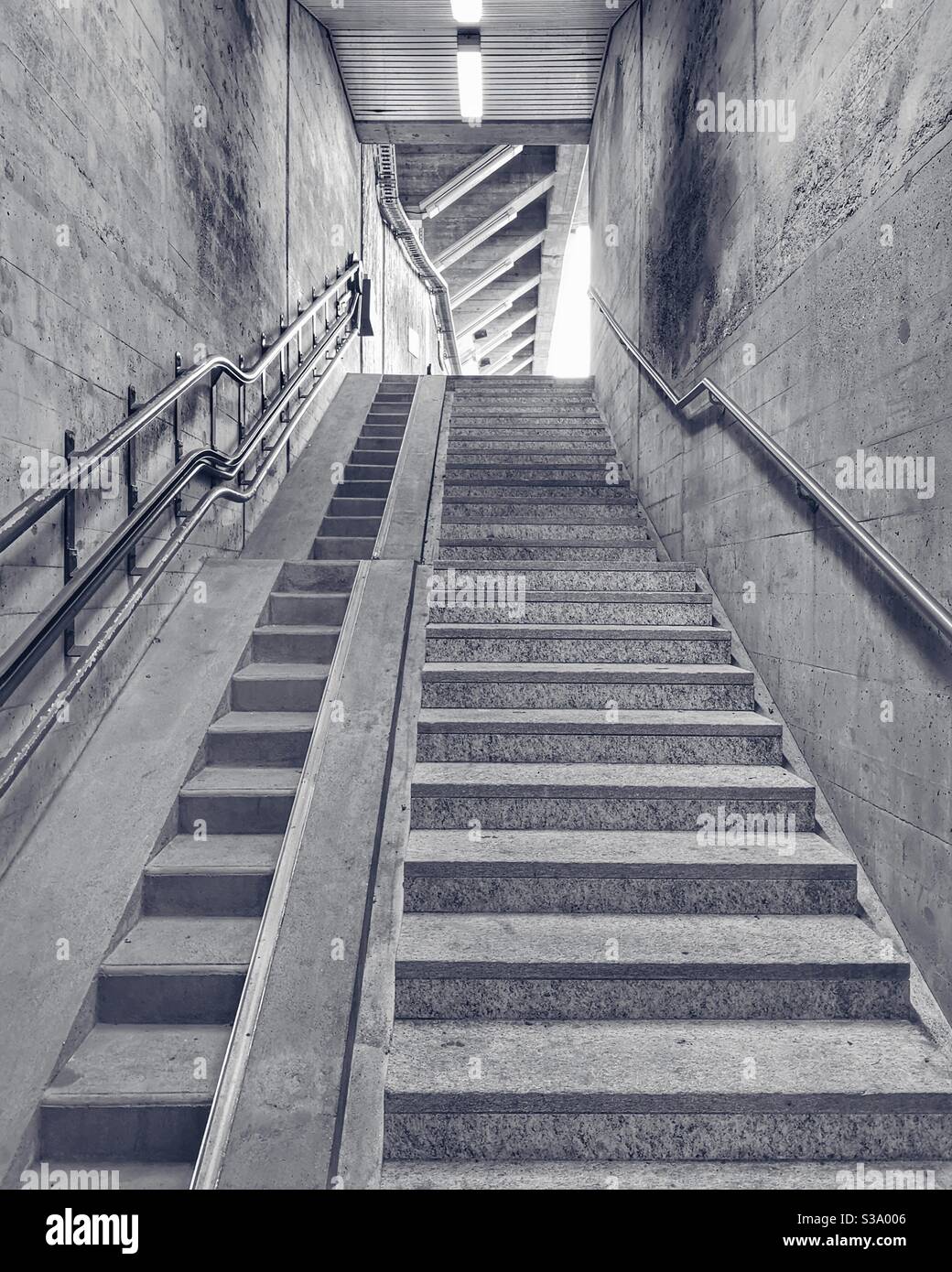 Upstairs- staircase in a Swiss railway station Stock Photo - Alamy