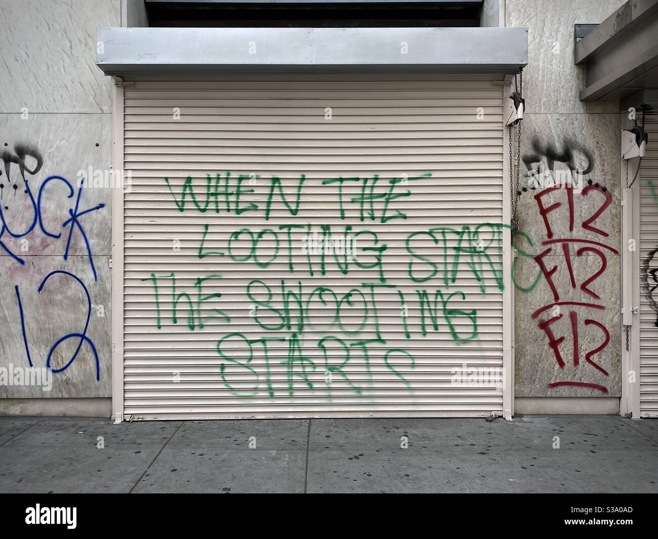 LOS ANGELES, CA, MAY 30, 2020: graffiti referencing US president's ...