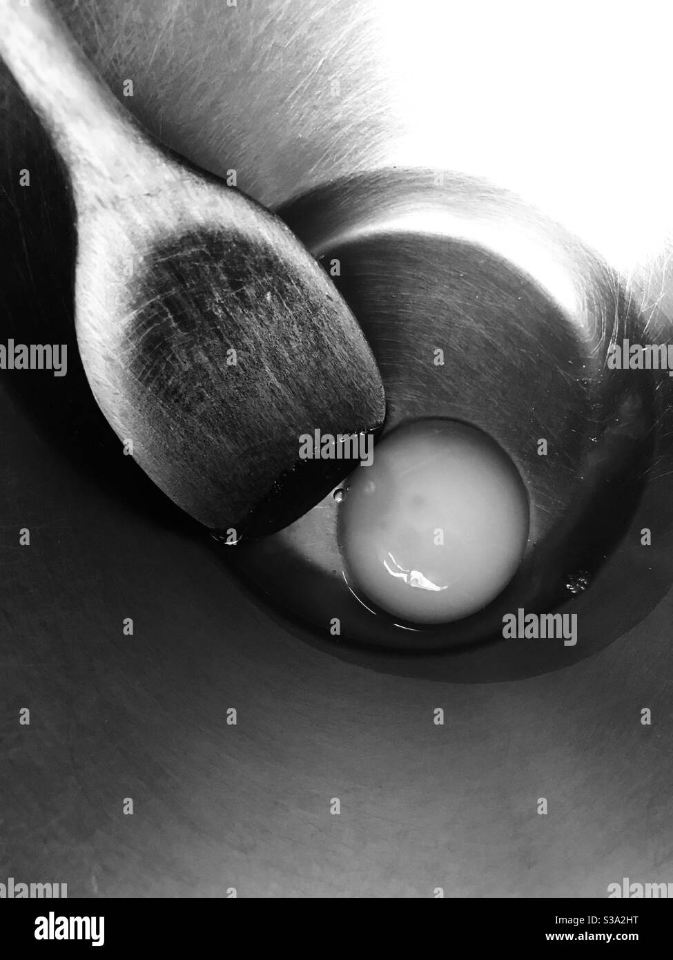 Wooden spoon white bowl Black and White Stock Photos & Images - Alamy