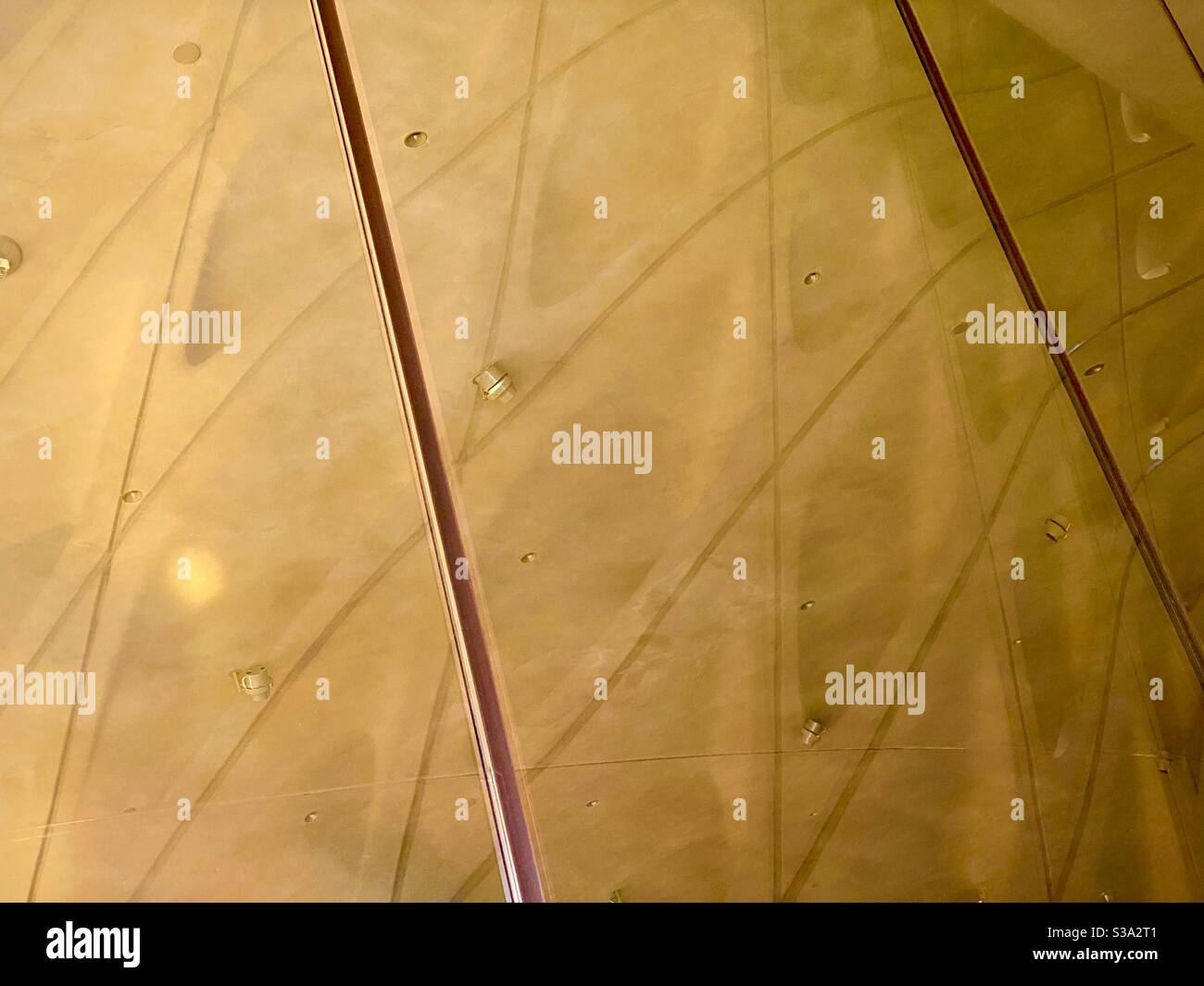 Abstract pattern created with reflections of concrete shapes seen in ...