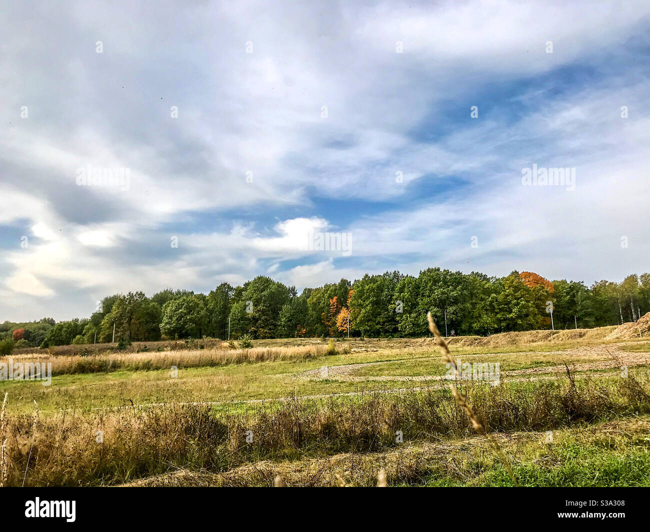 Gloomy autumn landscape with clouds Stock Photo - Alamy