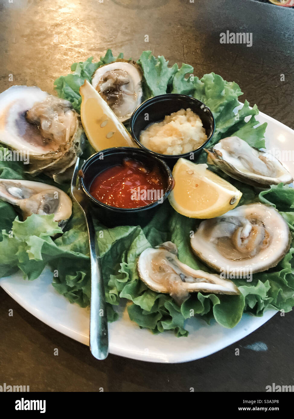 Oyster on half shell hi-res stock photography and images - Alamy