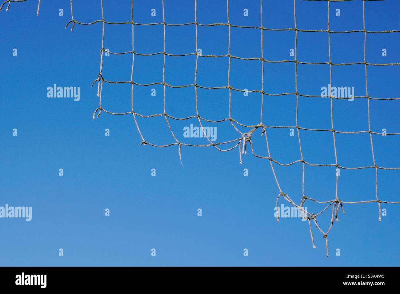 broken rope net Stock Photo - Alamy
