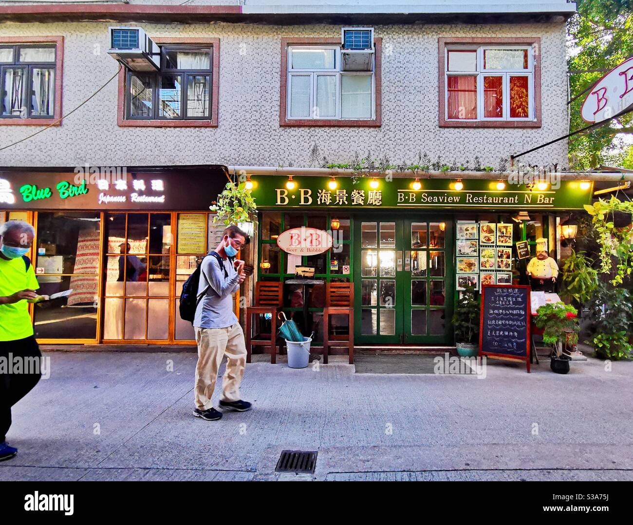 Yung Shue Wan Main Street on Lamma Island in Hong Kong Stock Photo - Alamy