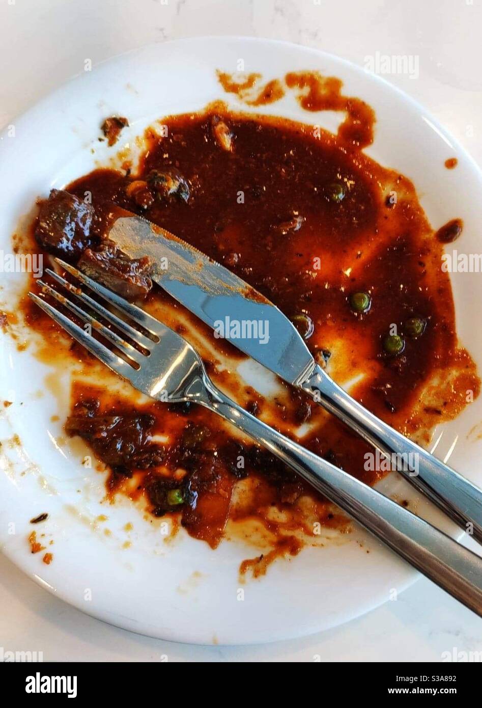 Dirty dinner plate Stock Photo - Alamy