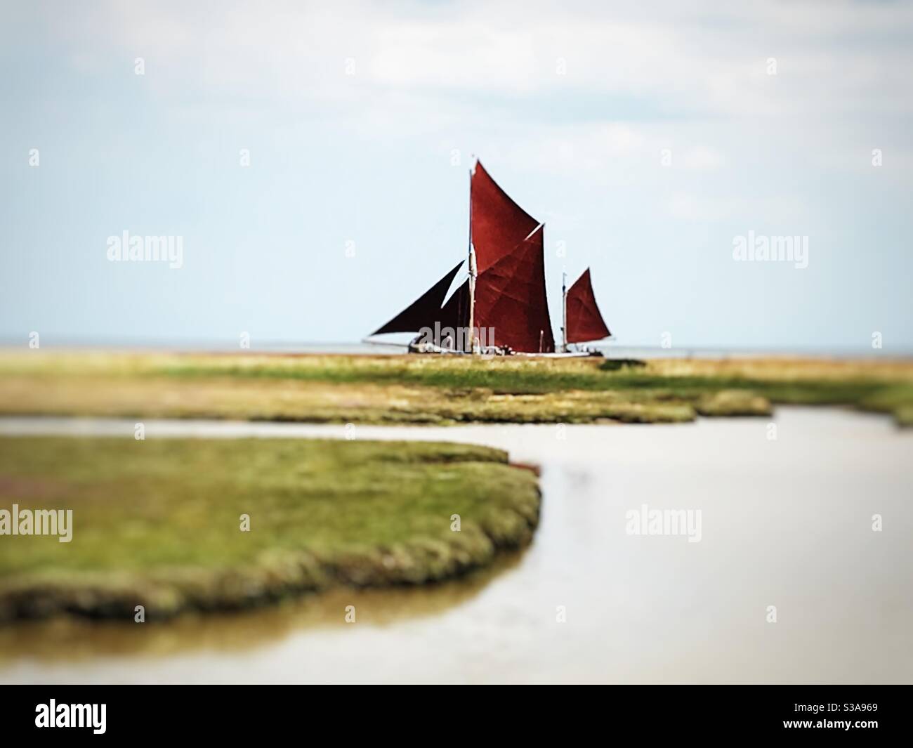 Barge sailing on the river Ore, shingle Street, Suffolk, England Stock ...