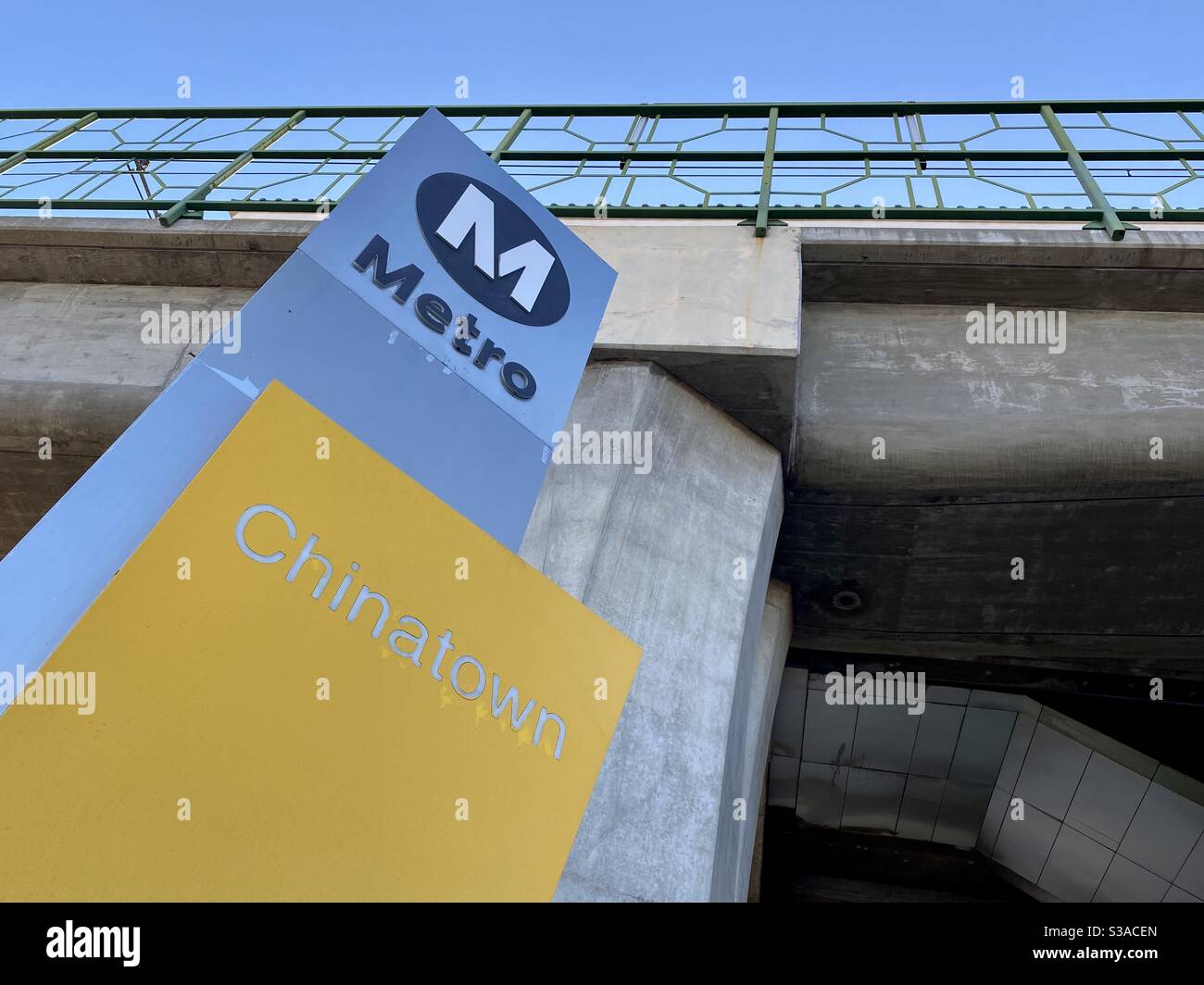 LOS ANGELES, CA, JUL 2020: looking up at yellow sign for LA Metro China ...