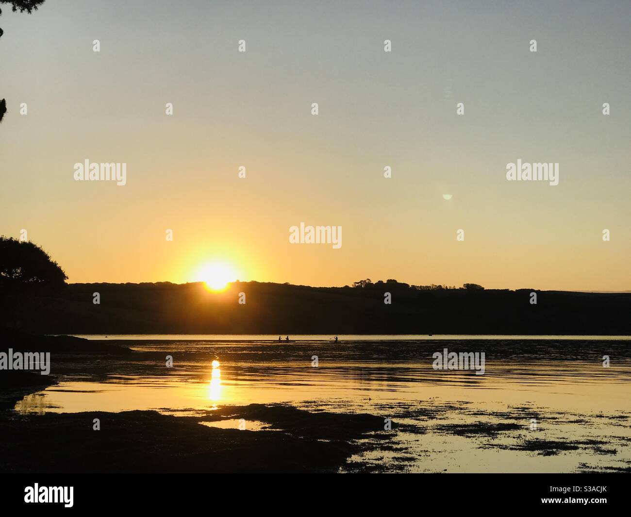 angel sunrise at Loe Beach Stock Photo - Alamy