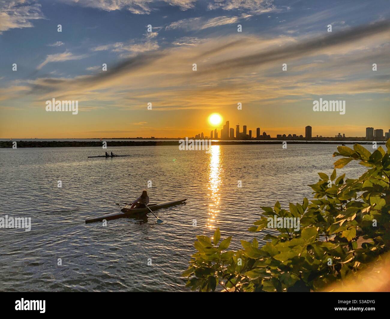 The sun sets over Lake Ontario in Toronto Stock Photo - Alamy