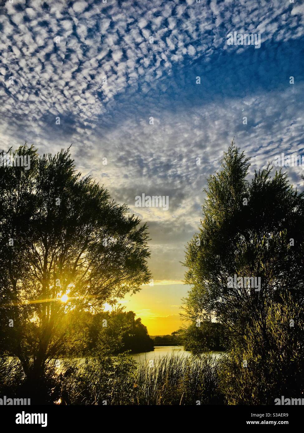 Mackerel sky sunset hi-res stock photography and images - Alamy
