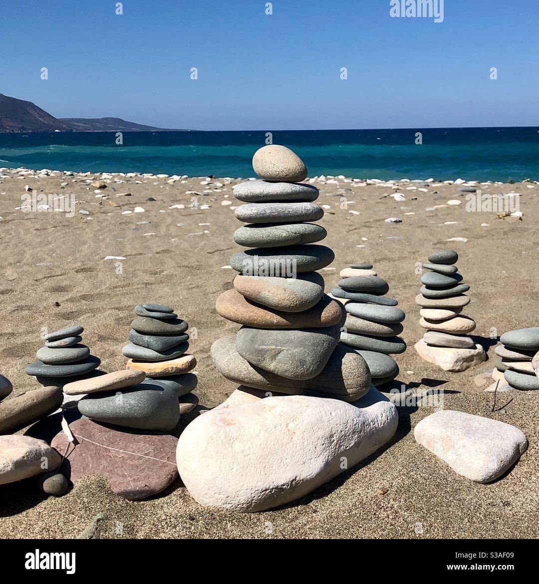 Stone stacks on beach Stock Photo - Alamy