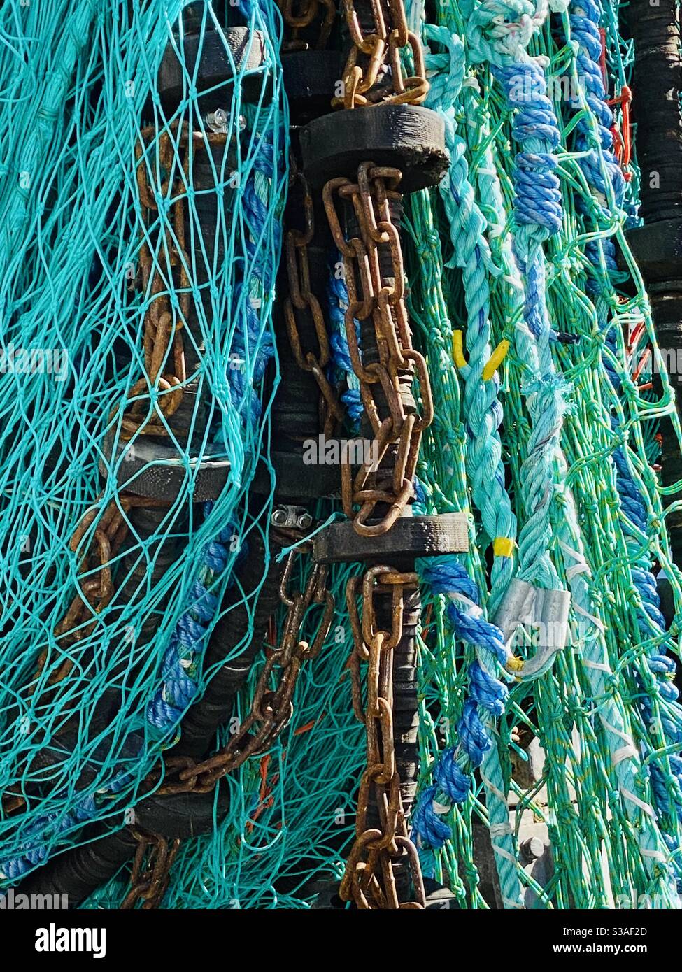 Fisherman’s bets on a roller - multicoloured trawler nets Stock Photo ...