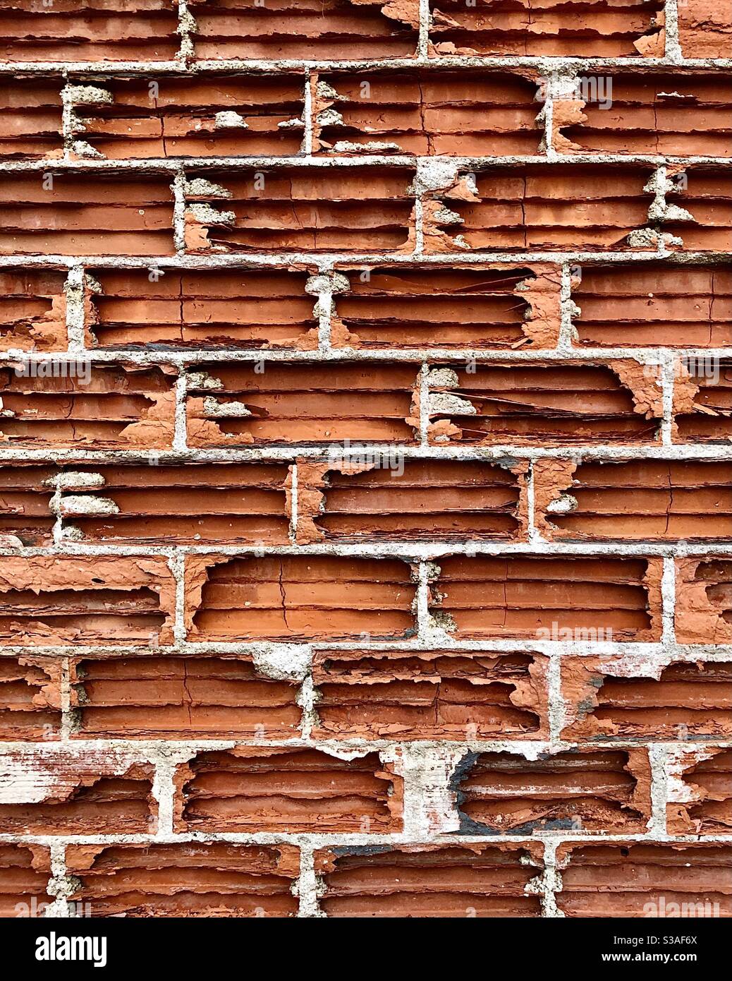 Detail of frost damaged brick wall Stock Photo - Alamy