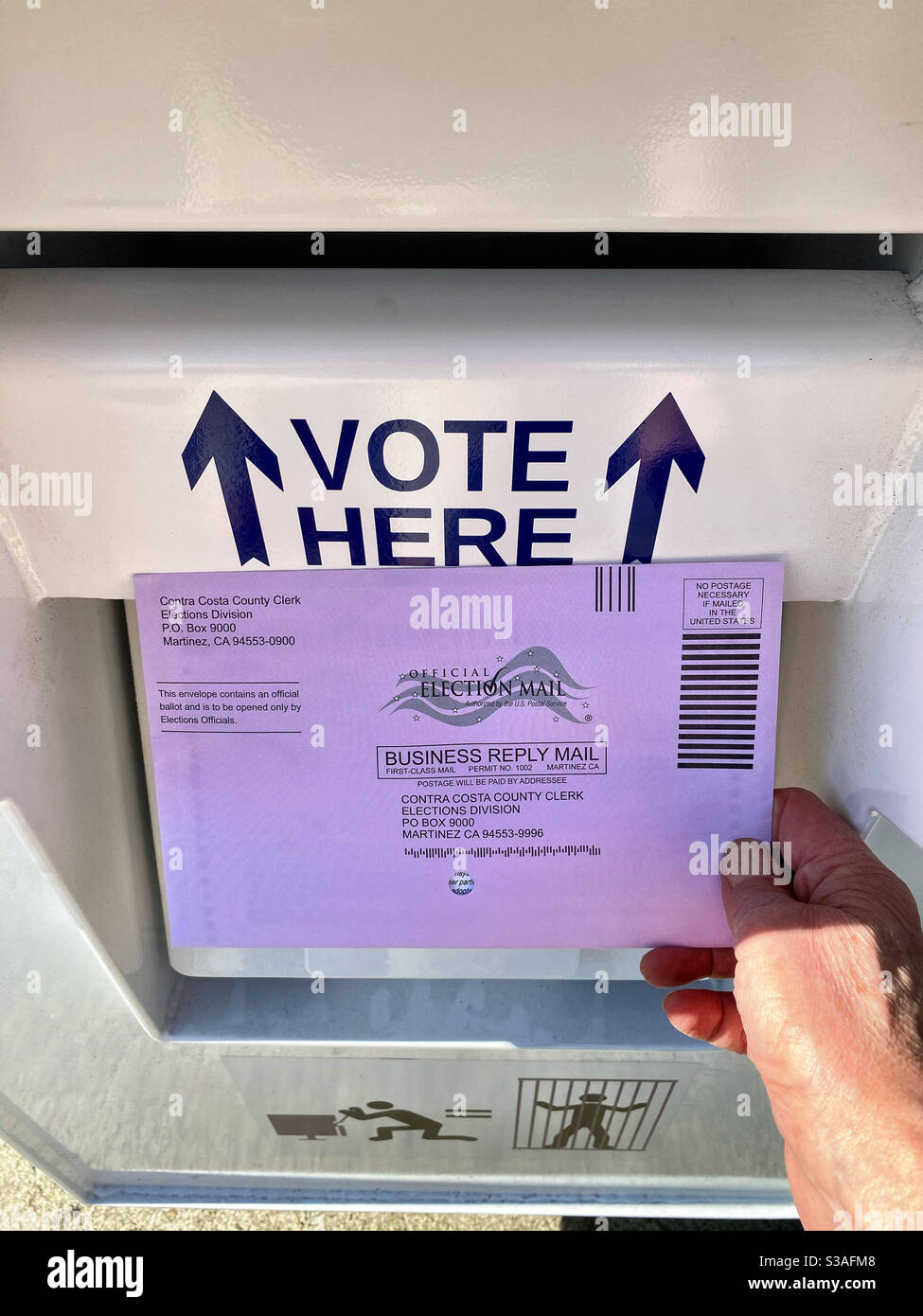 Voting at a ballot drop box hi-res stock photography and images - Alamy