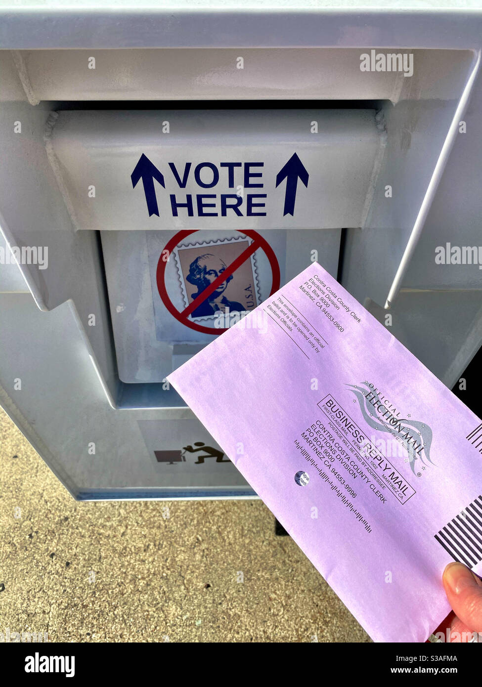 Voting at a ballot drop box hi-res stock photography and images - Alamy