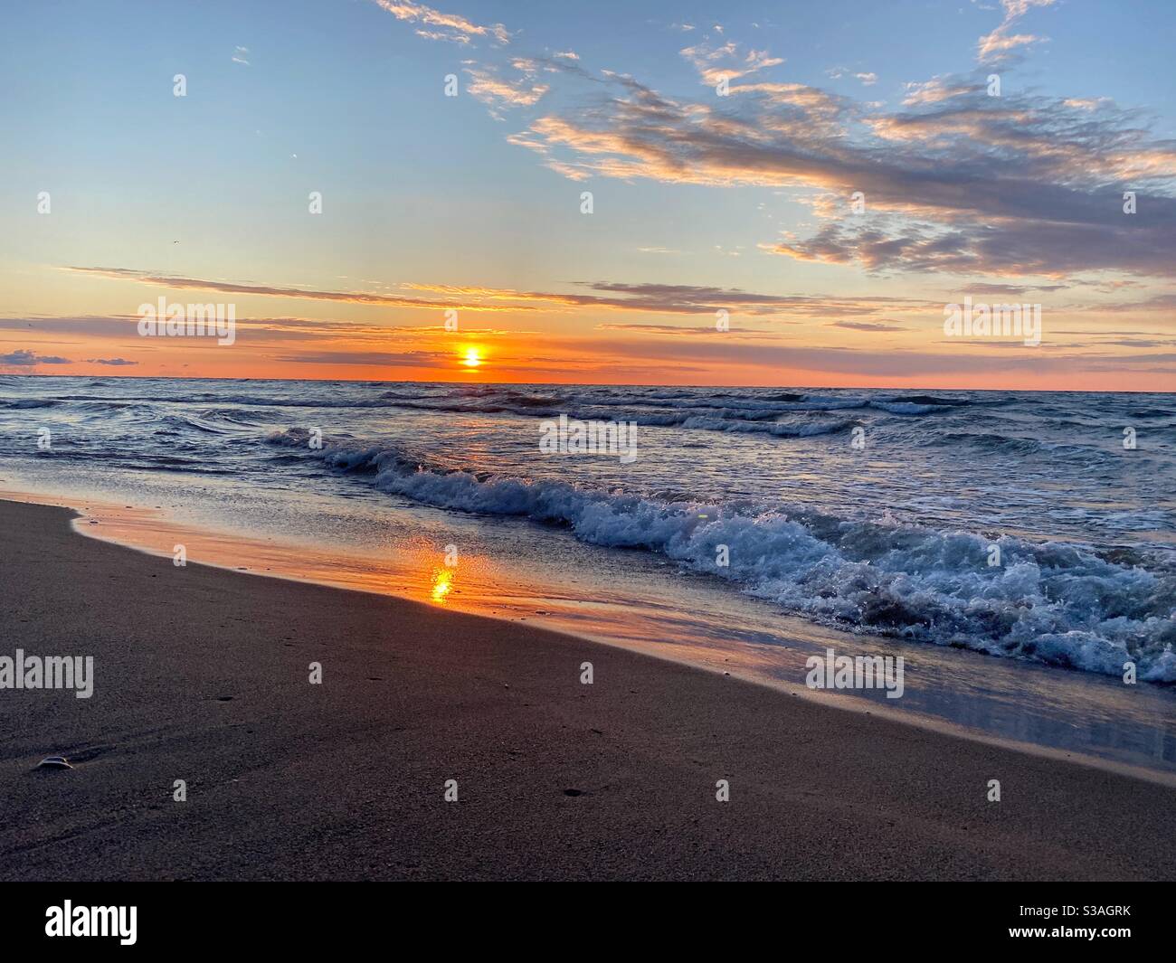 Fall beach sunrise Stock Photo - Alamy